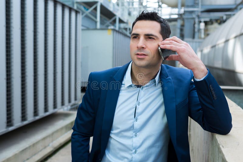 Handsome Engineer Talking on Mobile Phone Stock Photo - Image of ...