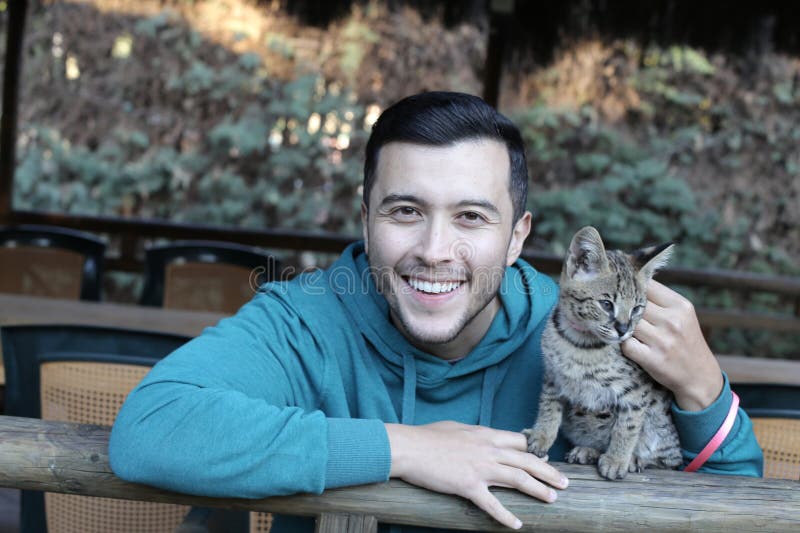 Handsome Ethnic Man and His Ultra Cute Cat Stock Image - Image of ...