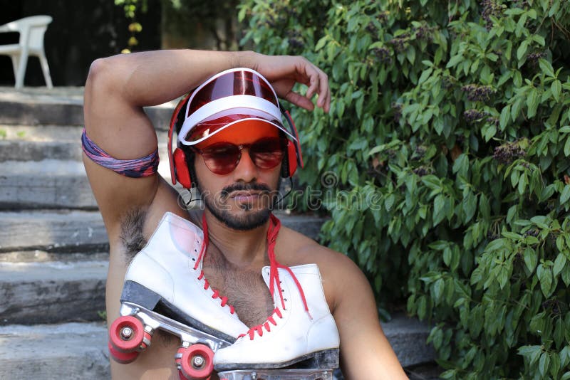Handsome Ethnic Man with Roller Blades and Edgy Look Stock Photo ...
