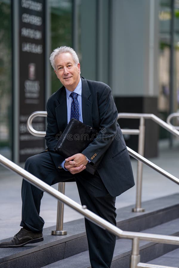 Handsome Executive Businessman Posing on a Staircase by an Office ...