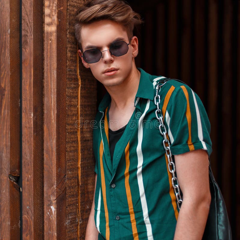 Handsome Fashion Model Man With Sunglasses In A Colored Shirt W Stock