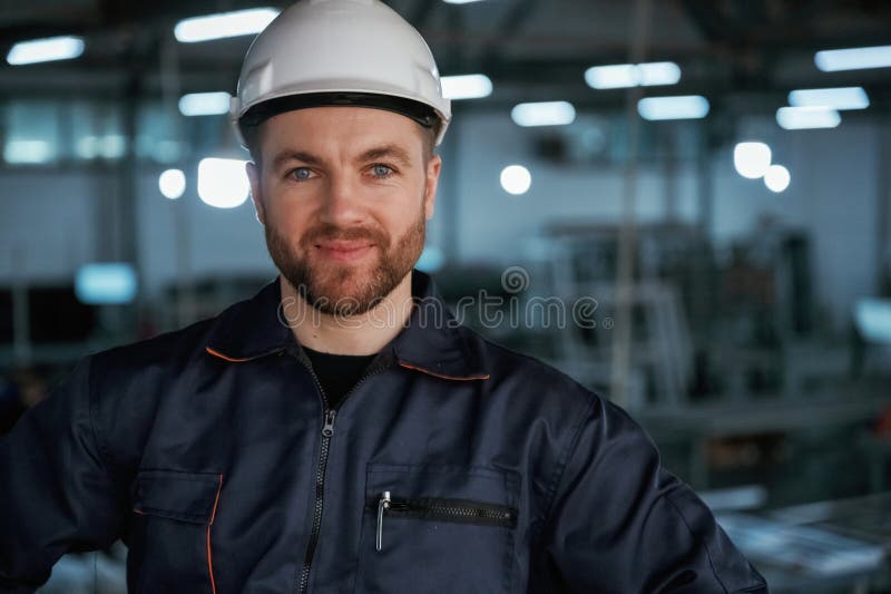 Handsome Friendly Guy. Factory Worker is Indoors with Hard Hat Stock ...