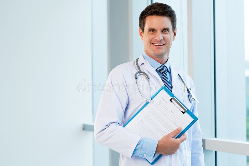 Handsome General Practitioner Stock Image - Image of reading ...