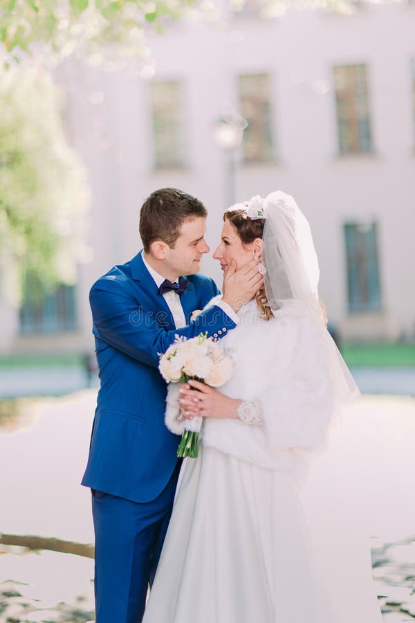 Handsome Groom Holds in Hands Beautiful Bride S Face Close Up Outdoors ...