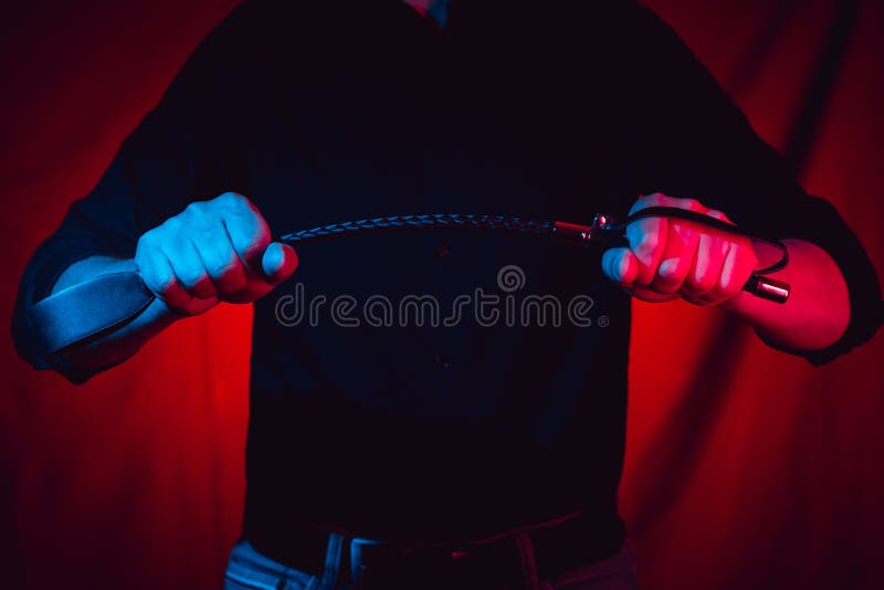 Handsome Guy with a BDSM Whip in His Hands Stock Image - Image of ...
