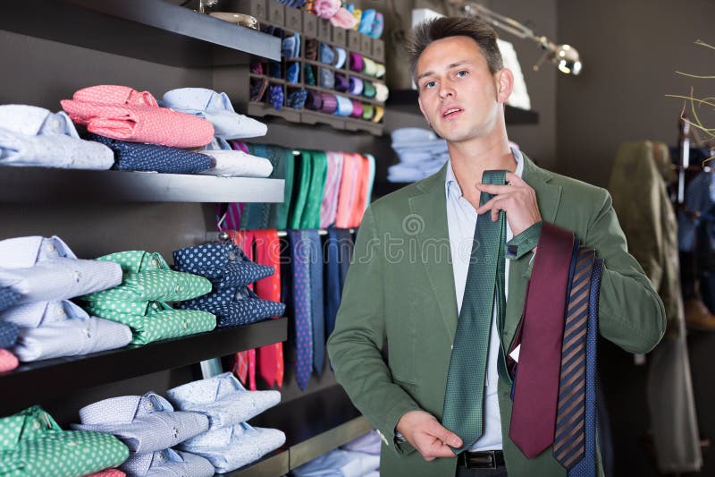 Handsome Guy Choosing New Tie Stock Image - Image of patterns ...