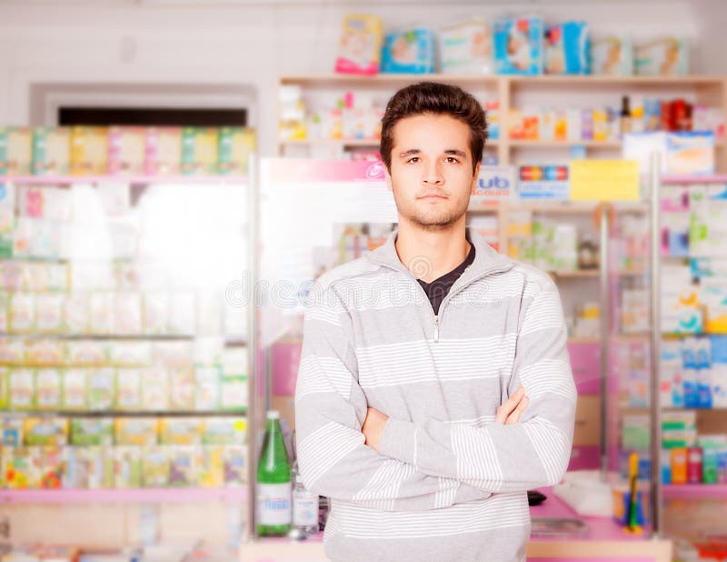 Handsome Guy in Front of Pharmacy Stand Stock Photo - Image of cheerful ...