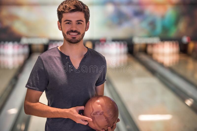 Man playing bowling stock photo. Image of players, casual - 100980084