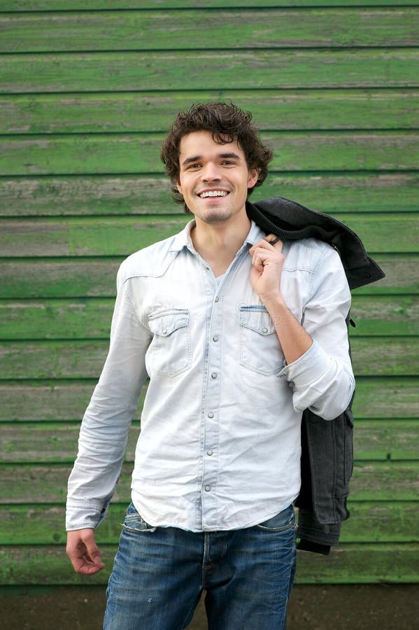 Handsome Guy Holding Jacket Outdoors Stock Image - Image of male ...