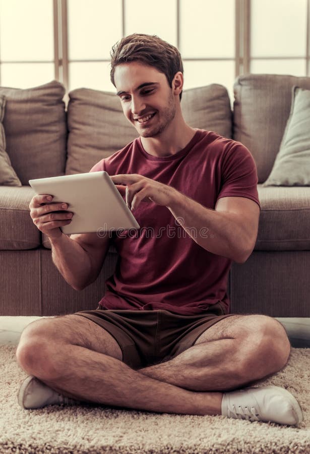 Handsome guy at home stock photo. Image of cozy, apartment - 98588460