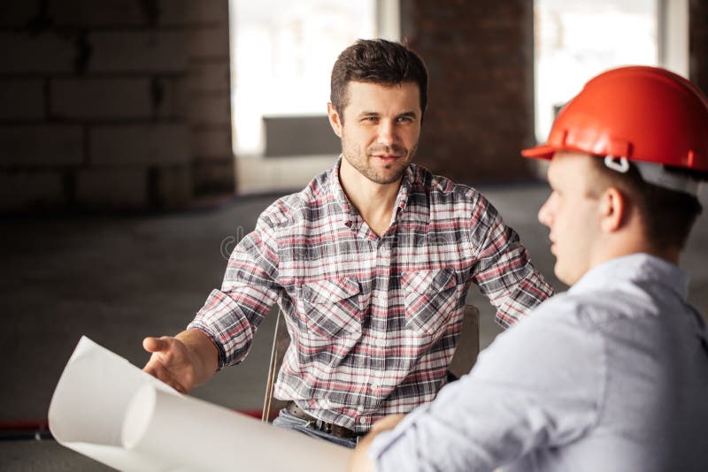 Handsome Guy Looking at the Engineer and Asking a Help Stock Image ...