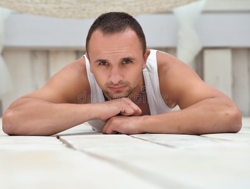Handsome Guy Lying on the Floor, at Home Stock Image - Image of ...