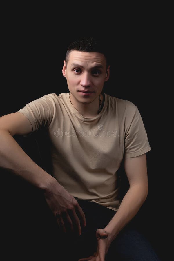 Handsome Guy Posing in Studio on Isolated Black Background. Studio ...