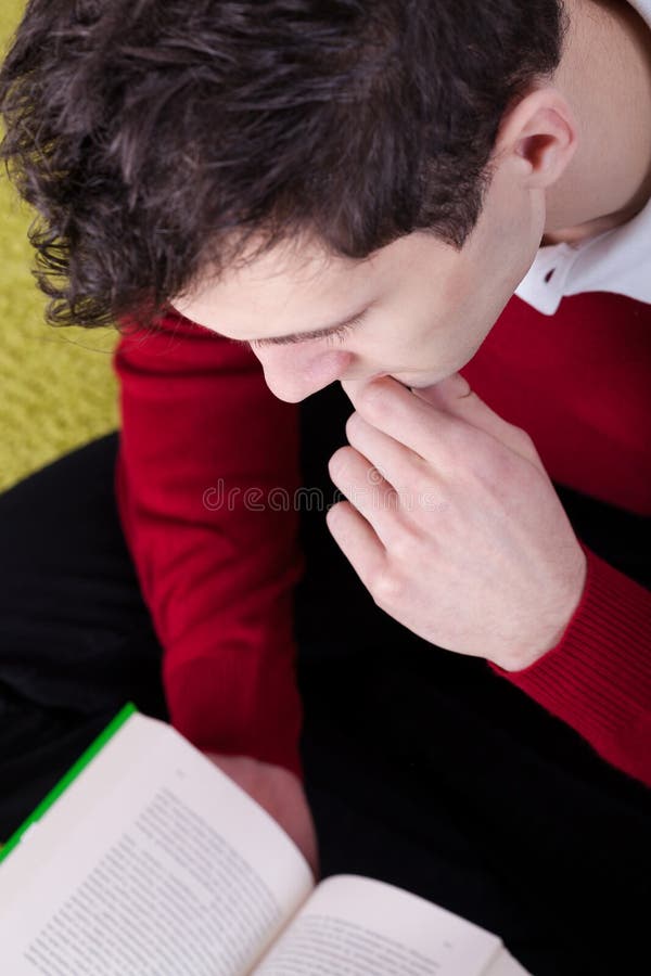 Handsome guy reading stock photo. Image of sitting, holding - 40957320