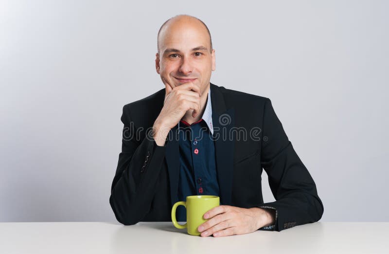 Handsome Guy Sits at the Desk Stock Image - Image of smile, desk: 81229075