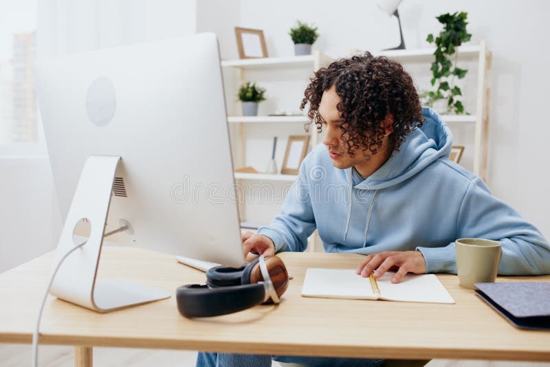 Handsome Guy Sitting in Front of the Computer Internet Online ...