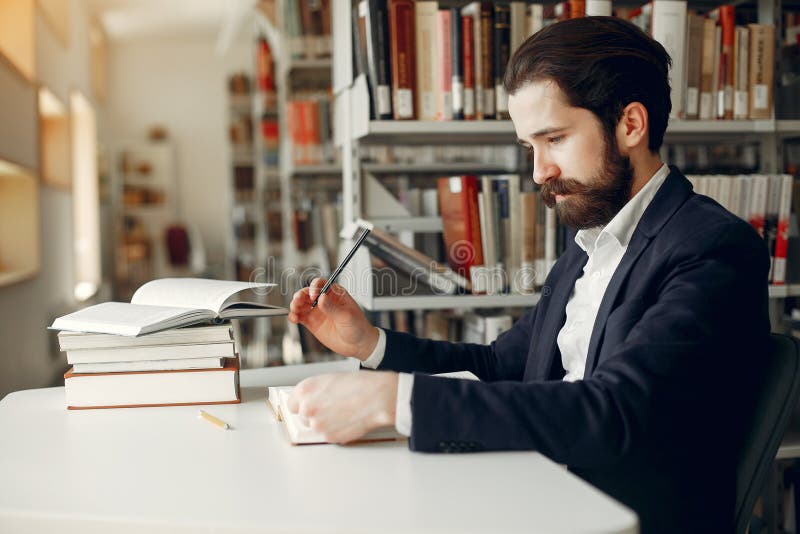 Handsome Guy Study at the Library Stock Photo - Image of paper, hipster ...