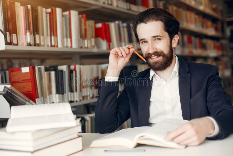 Handsome Guy Study at the Library Stock Photo - Image of literature ...