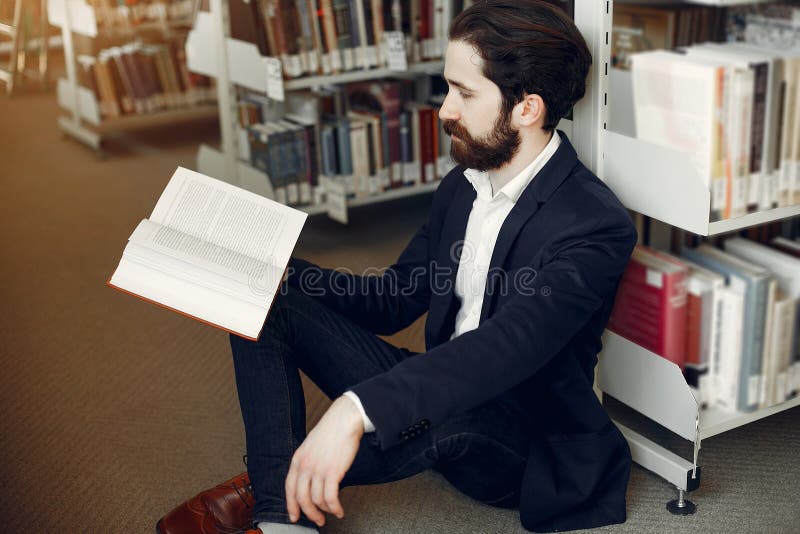 Handsome Guy Study at the Library Stock Photo - Image of holding, book ...