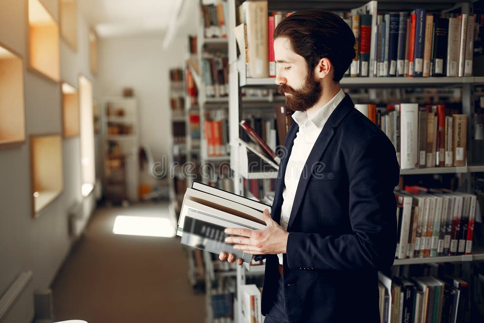 Handsome Guy Study at the Library Stock Photo - Image of learning ...