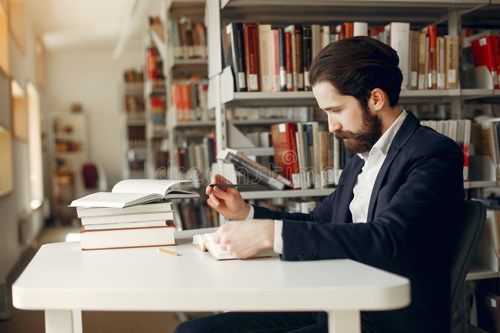 Handsome Guy Study at the Library Stock Photo - Image of person ...