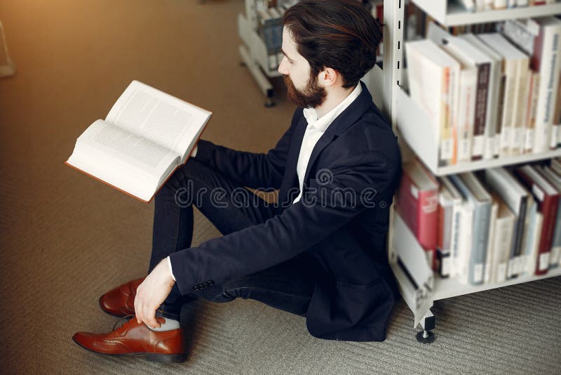 Handsome Guy Study at the Library Stock Photo - Image of bookshelf ...
