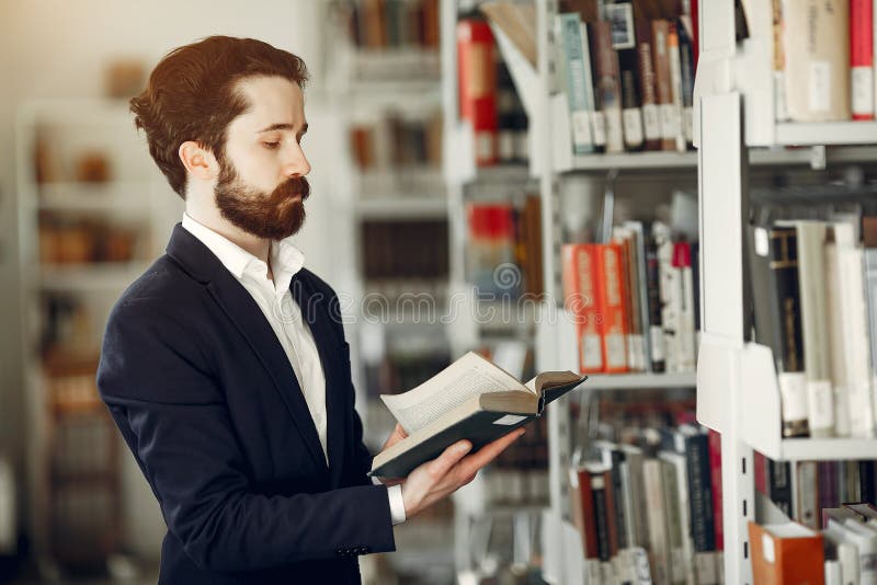 Handsome Guy Study at the Library Stock Photo - Image of handsome ...