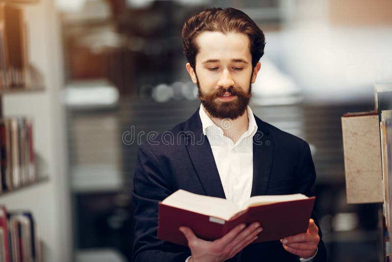 Handsome Guy Study at the Library Stock Image - Image of bookshelf ...