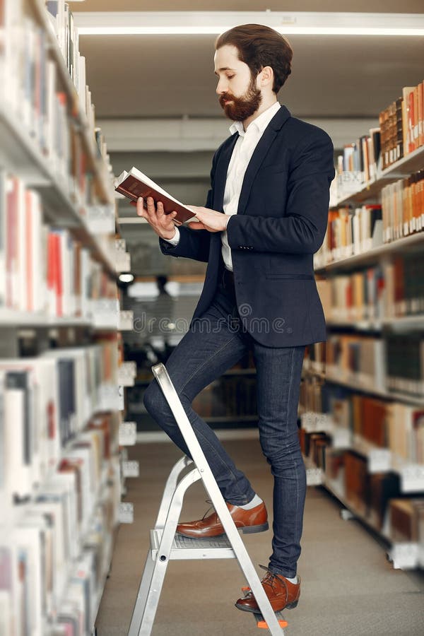 Handsome Guy Study at the Library Stock Photo - Image of literature ...