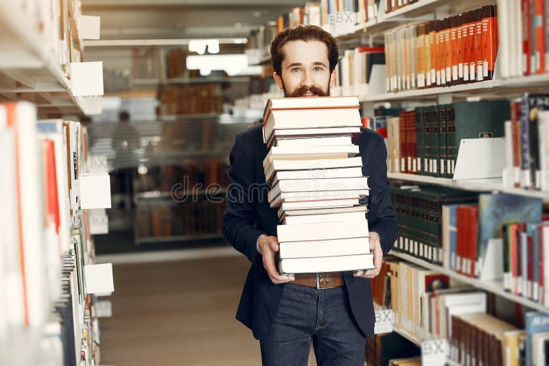 Handsome Guy Study at the Library Stock Photo - Image of book, looking ...