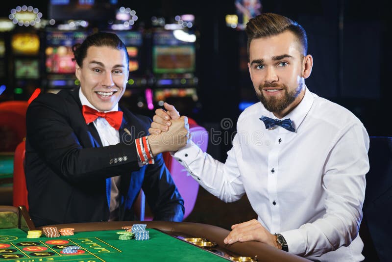 Handsome Guys Playing Roulette in the Casino Stock Image - Image of ...