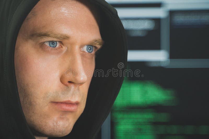Hacker in black hoodie. stock photo. Image of hiding - 159548800