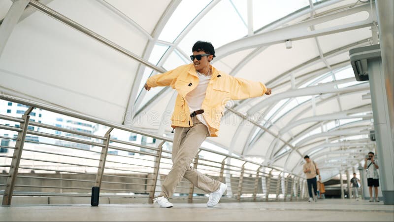 Handsome Asian Hipster Dancing while Using Head Spin at Corridor ...