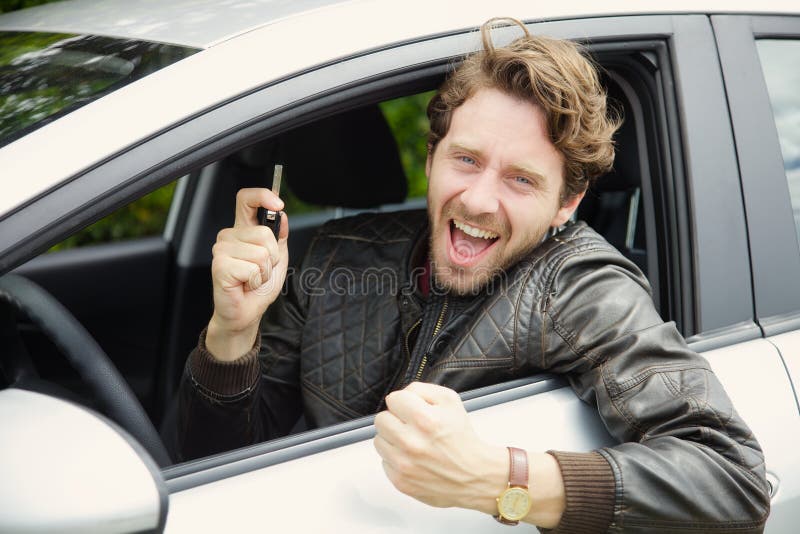 Handsome Happy Man in Car Smiling Holding Key Stock Image - Image of ...