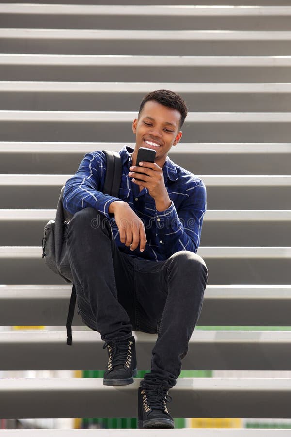 Handsome Happy Man Sitting on Steps Using Smart Phone Stock Image ...