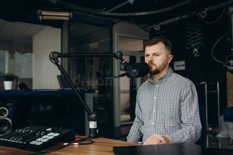 Handsome Happy Radio Host Moderating in Studio at College. Stock Photo ...