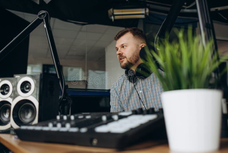 Handsome Happy Radio Host Moderating in Studio at College. Stock Photo ...