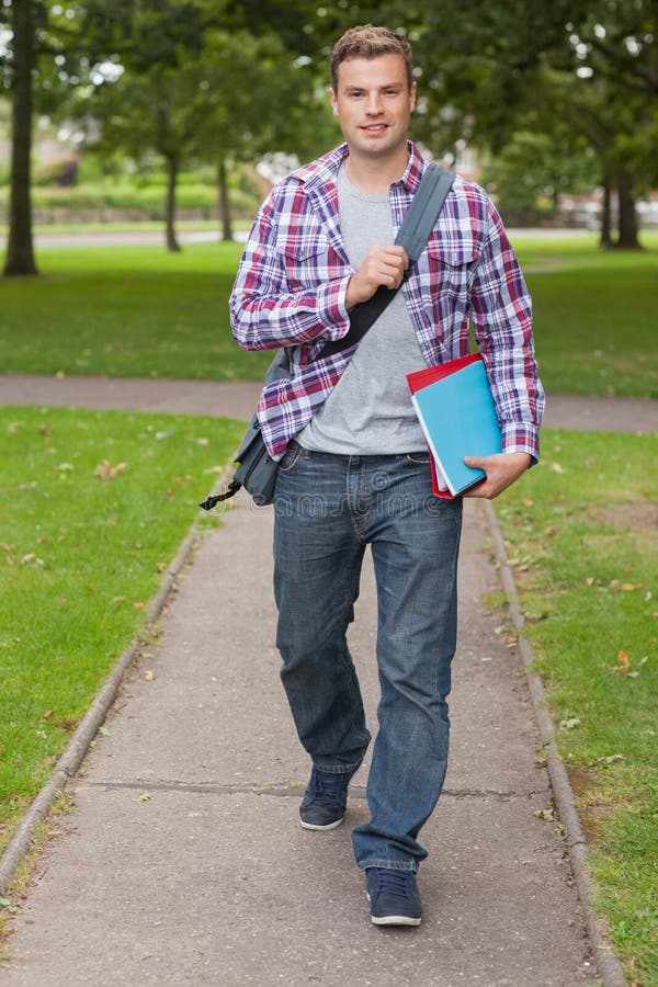 Handsome Happy Student Carrying Notebook and Folder Stock Image - Image ...