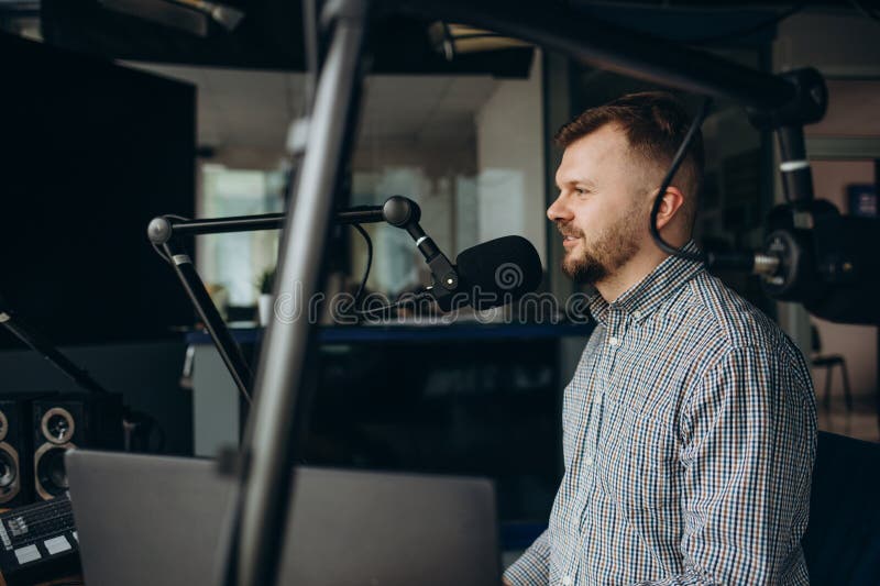 Handsome Happy Young Male Radio Host Broadcasting in Studio, Using ...