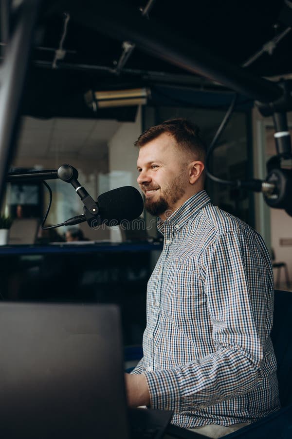 Handsome Happy Young Male Radio Host Broadcasting in Studio, Using ...