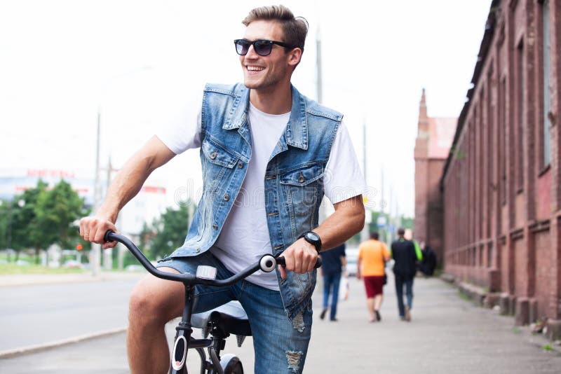 Handsome Hipster Enjoying City Ride by Bicycle. Stock Photo - Image of ...
