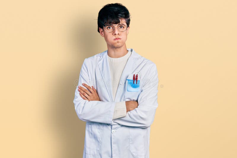 Handsome Hipster Young Man With Crossed Arms Wearing Doctor Uniform