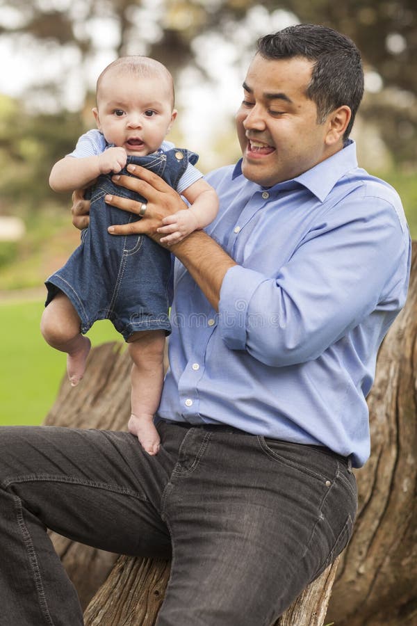 Handsome Hispanic Father and Son Posing for a Portrait Stock Photo ...