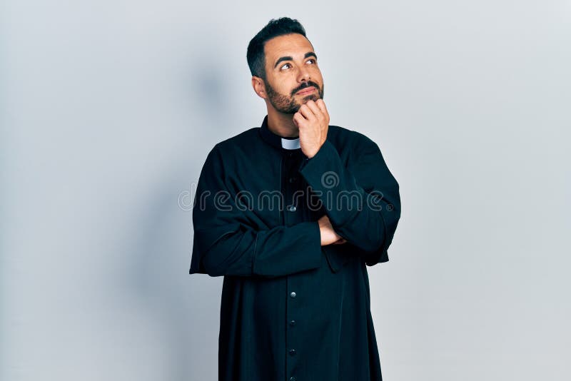 Handsome Hispanic Man with Beard Wearing Catholic Priest Robe with Hand ...