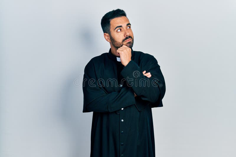 Handsome Hispanic Man with Beard Wearing Catholic Priest Robe with Hand ...