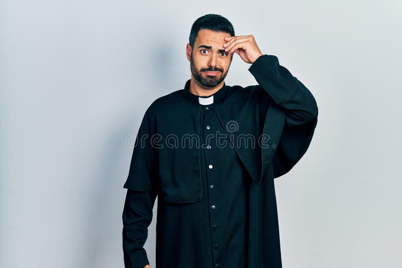 Handsome Hispanic Man with Beard Wearing Catholic Priest Robe Worried ...
