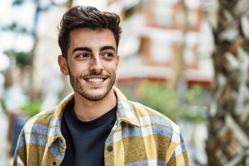 Handsome Hispanic Man Smiling Happy and Confident at the City Stock ...