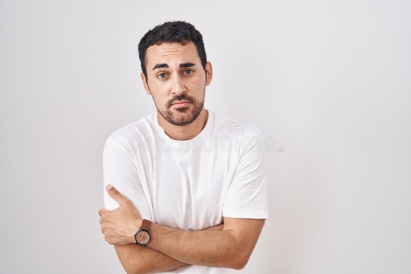 Handsome Hispanic Man Standing Over White Background Shaking and ...