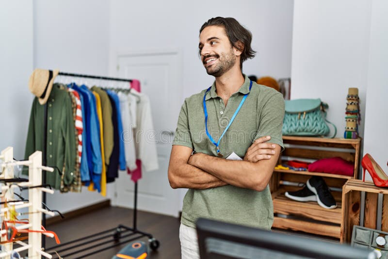 Handsome Hispanic Man Working As Shop Assistance at Retail Shop Stock ...