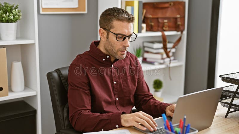 Handsome Hispanic Man with Wavy Hair Smiling while Recording and ...